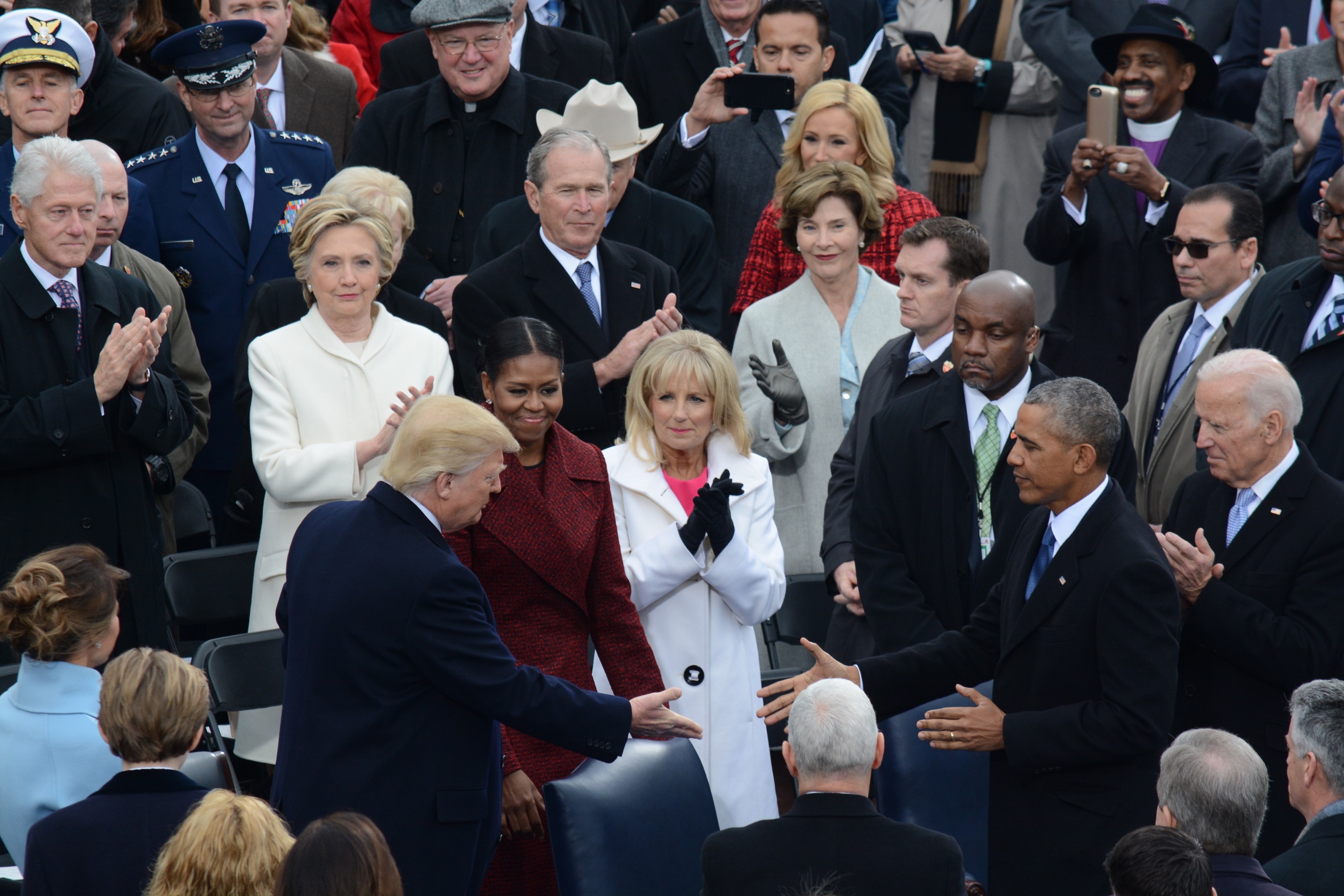 Peaceful exchange of power takes place as Trump prepares to take oath ...